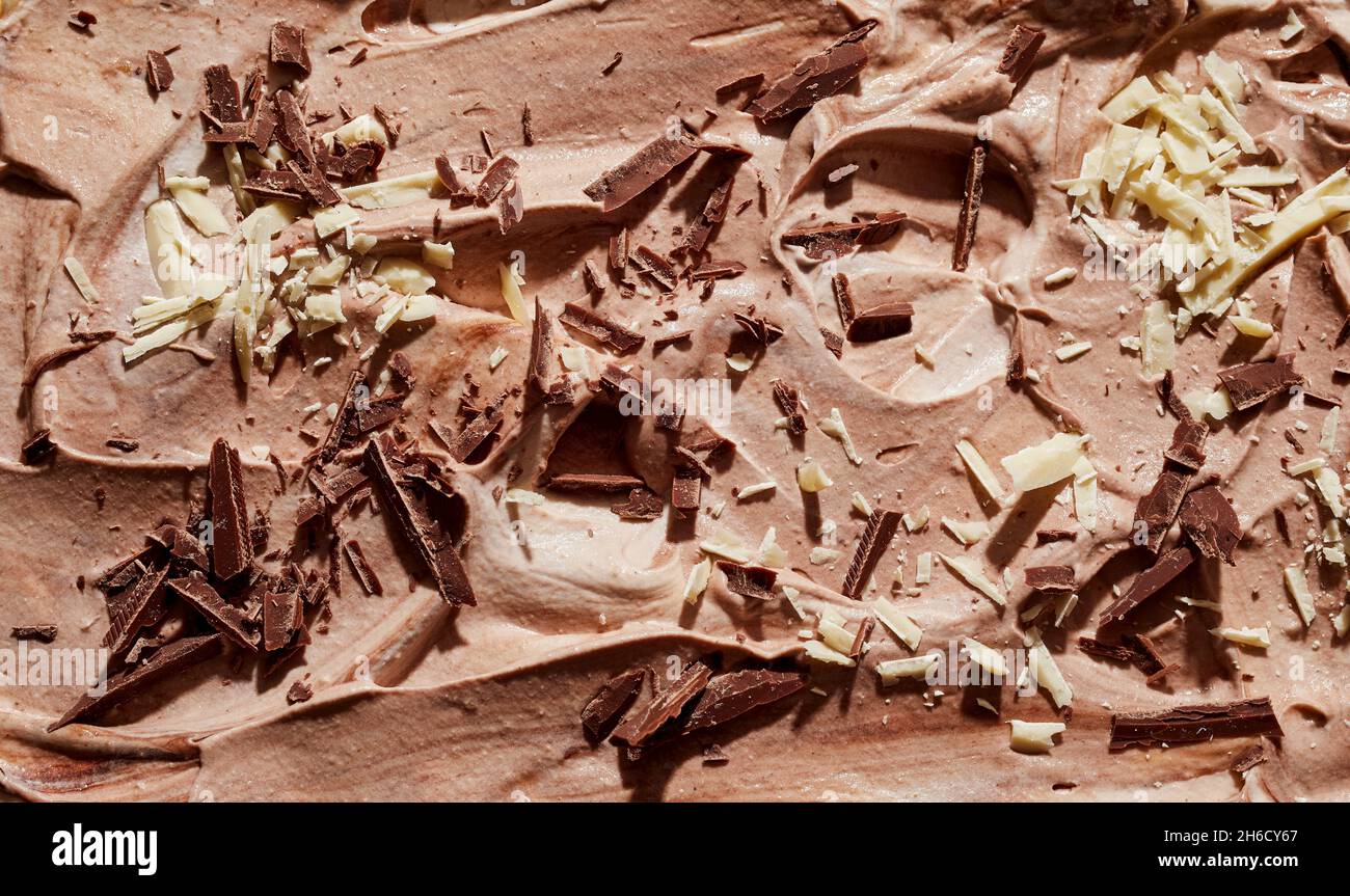 Chocolate ice cream dessert with flaked almonds and chocolate shavings ...
