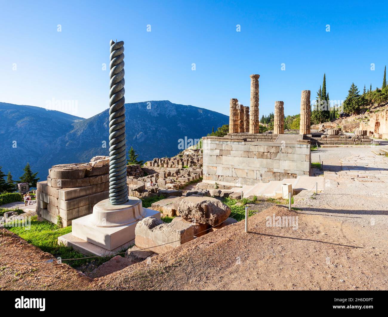 Serpent Column of Plataea and Temple of Apollo in Delphi. Delphi is ...