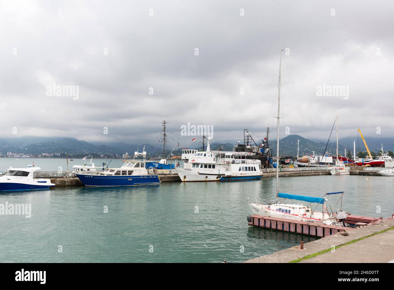 BATUMI, GEORGIA- JINE 26, 2021: View of Batumi sea port. Ships, boats ...