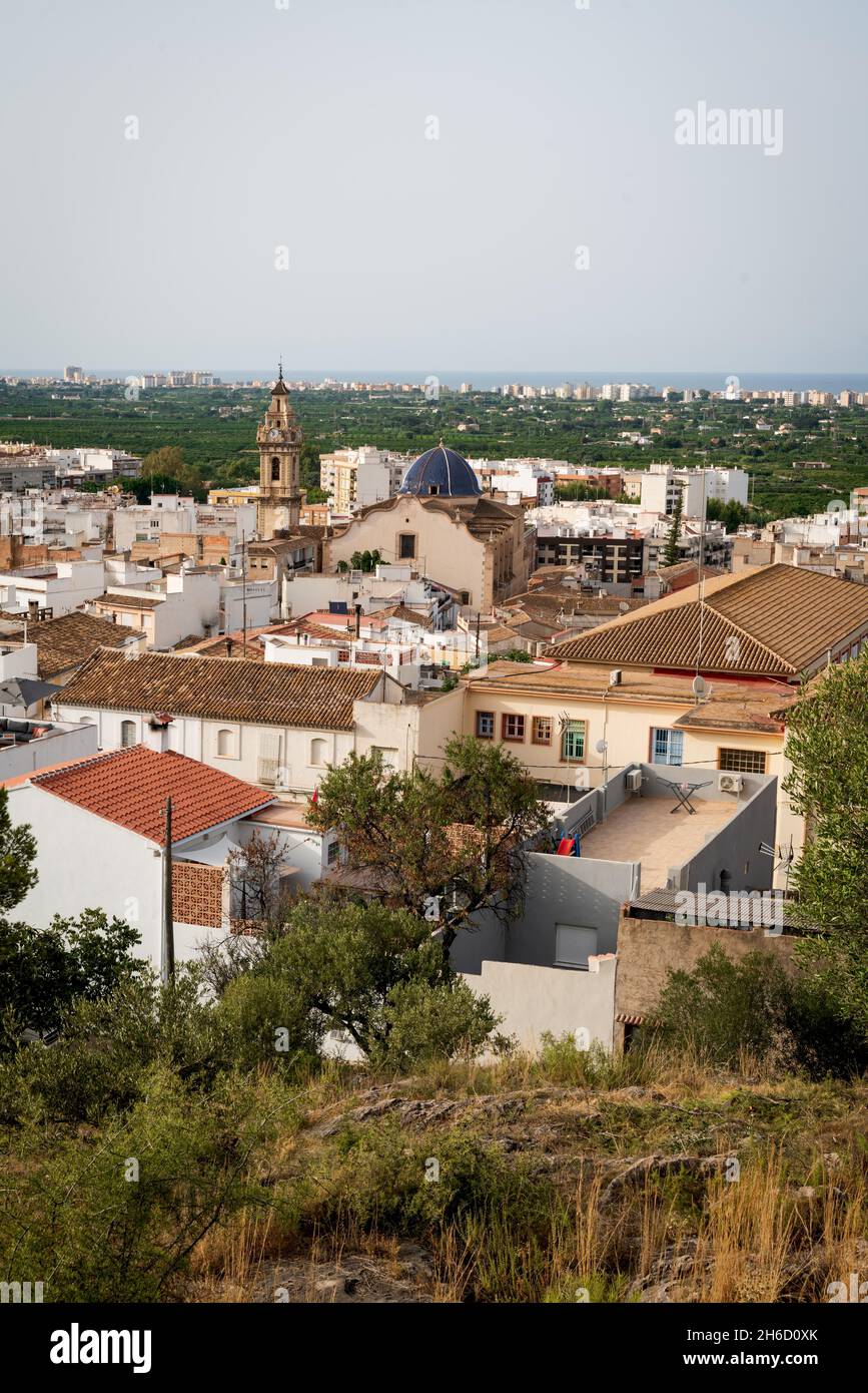 Roof view on old city of Oliva with the church tower and blue dome of ...