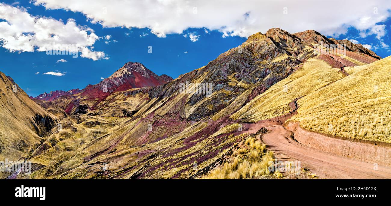 Pallay Punchu of Apu Takllo Rainbow Mountains in Peru Stock Photo - Alamy