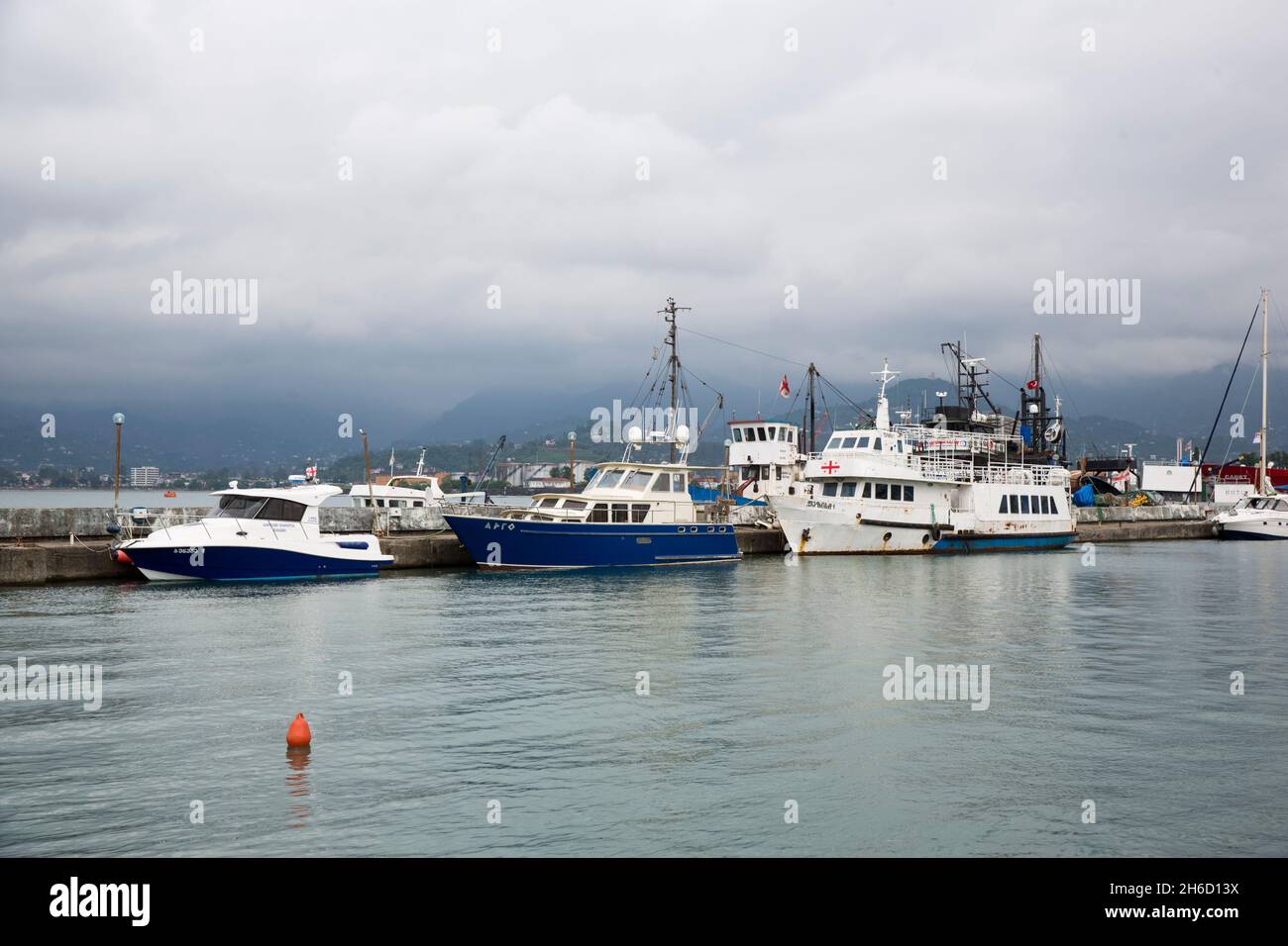 BATUMI, GEORGIA- JINE 26, 2021: View of Batumi sea port. Ships, boats ...