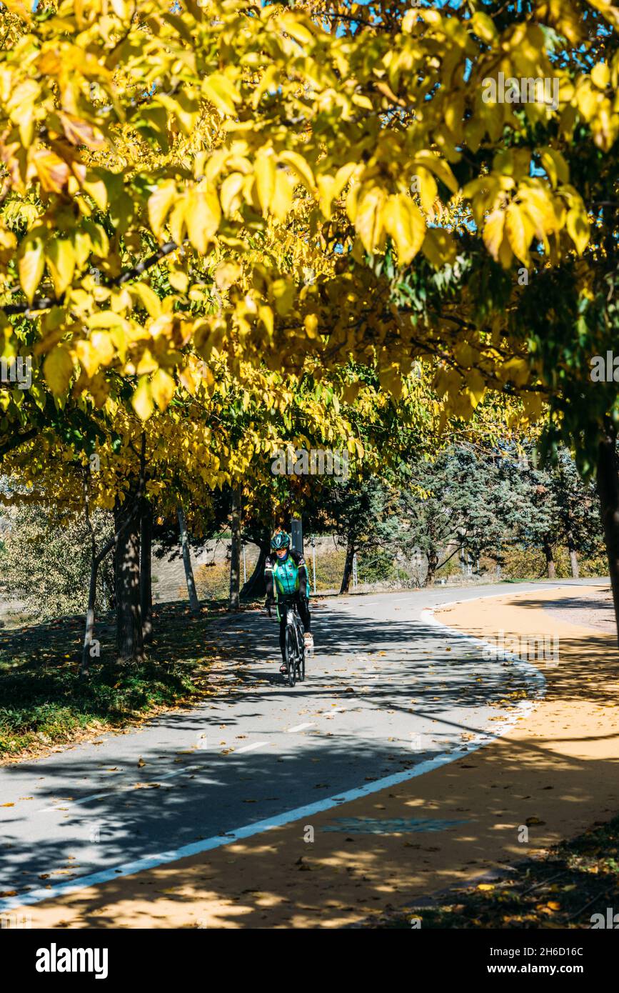 Bike lane with cyclist as part of Madrid's Anillo Verde cycle lane ...