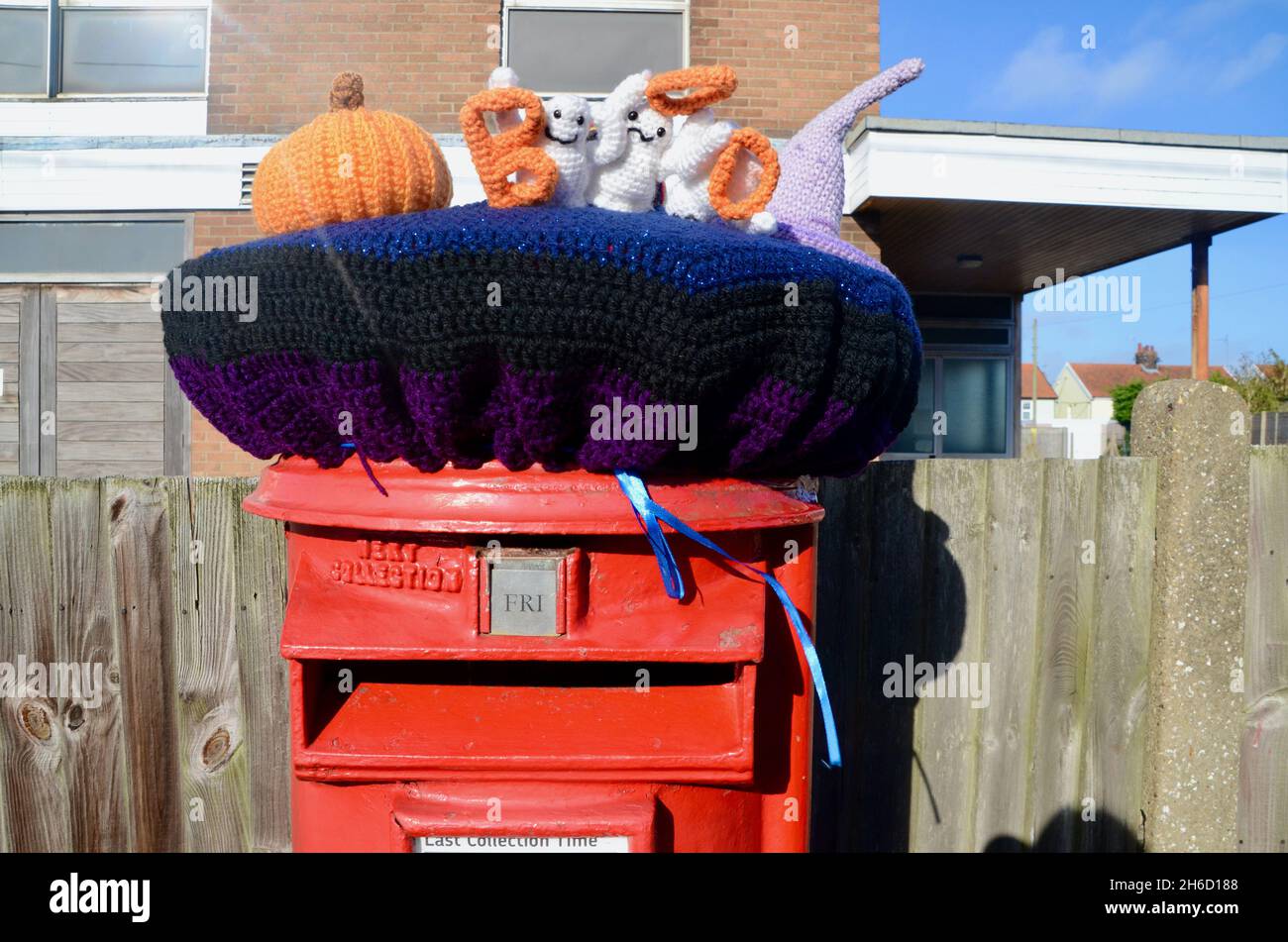 red post boxes decorated with knitted scenes in southwold suffolk ...