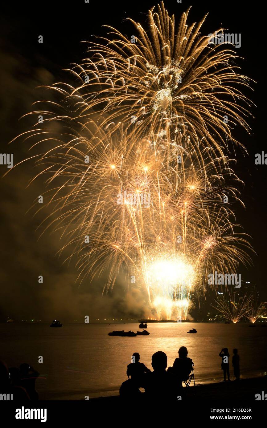 Firework celebration from the sea shore. Colorful fireworks celebration ...