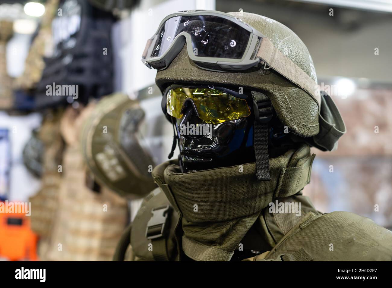 Mannequin in army uniform and equipment. Safety helmet and goggles ...