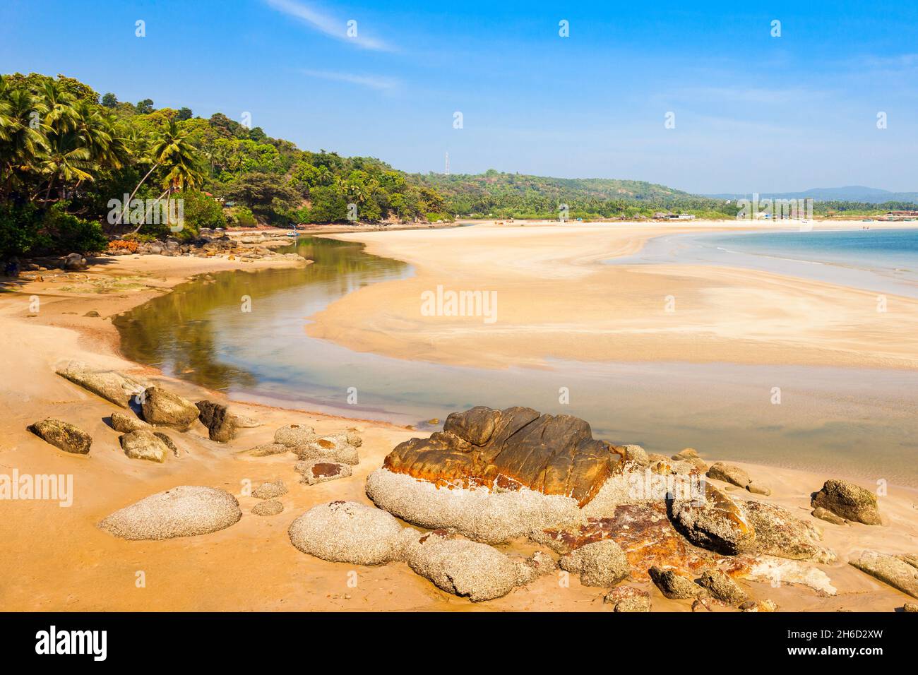 Beauty lonely beach with lagoon and yellow sand in Goa, India Stock ...