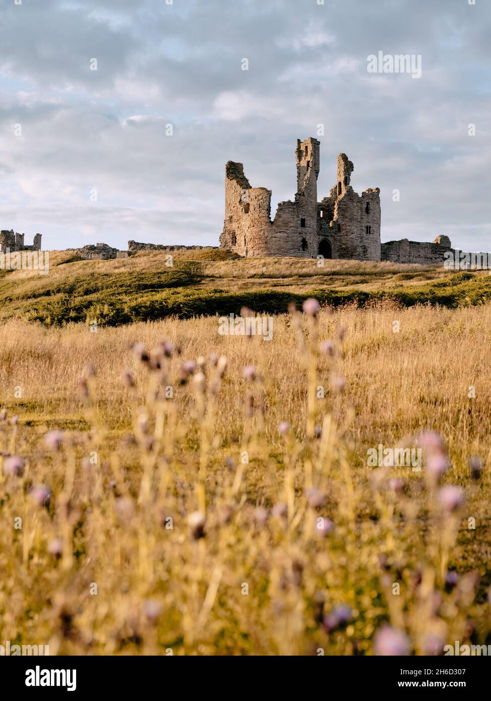 Dunstanburgh castle ruins hi-res stock photography and images - Alamy