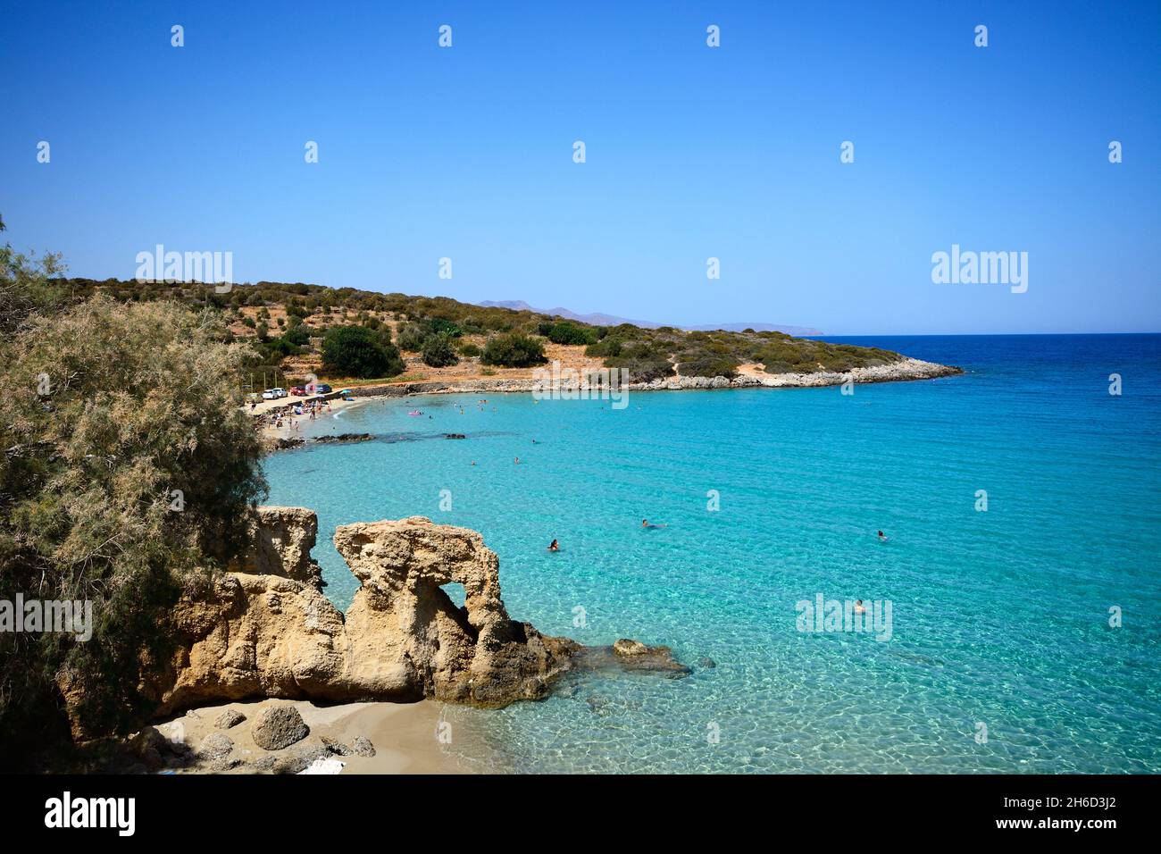 Tourists relaxing on the beach, Istro, Crete, Greece, Europe Stock ...