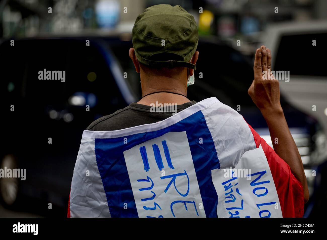 Bangkok, Thailand. 14th Nov, 2021. Demonstrators held up a three-finger ...
