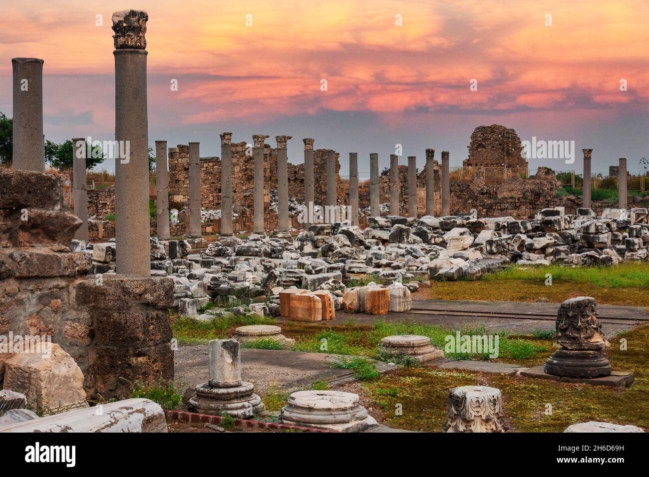 Ancient city ruins. Side Antalya. Colonnaded road and market place ...