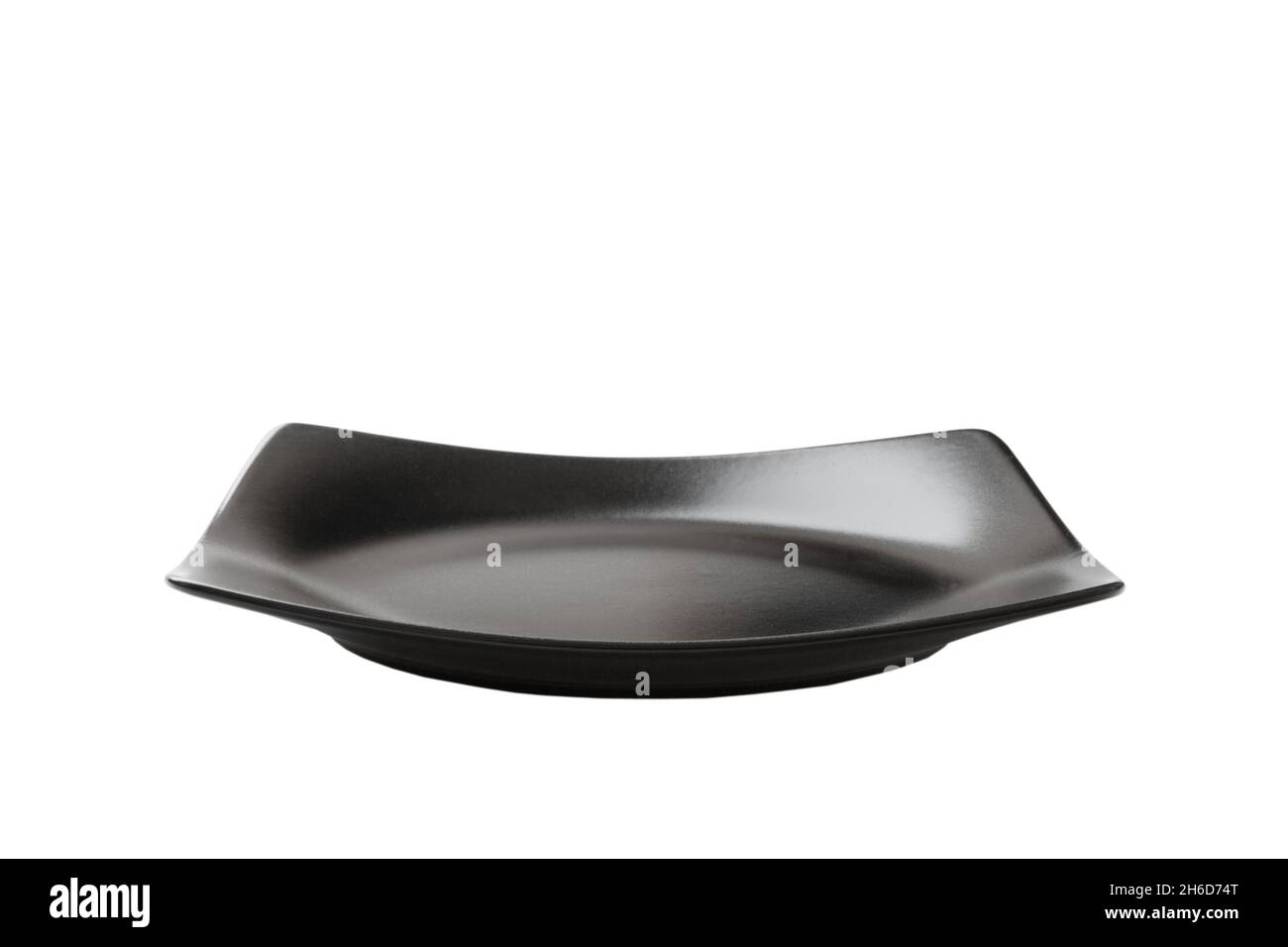 Black glass square plate isolated over white background. perspective ...