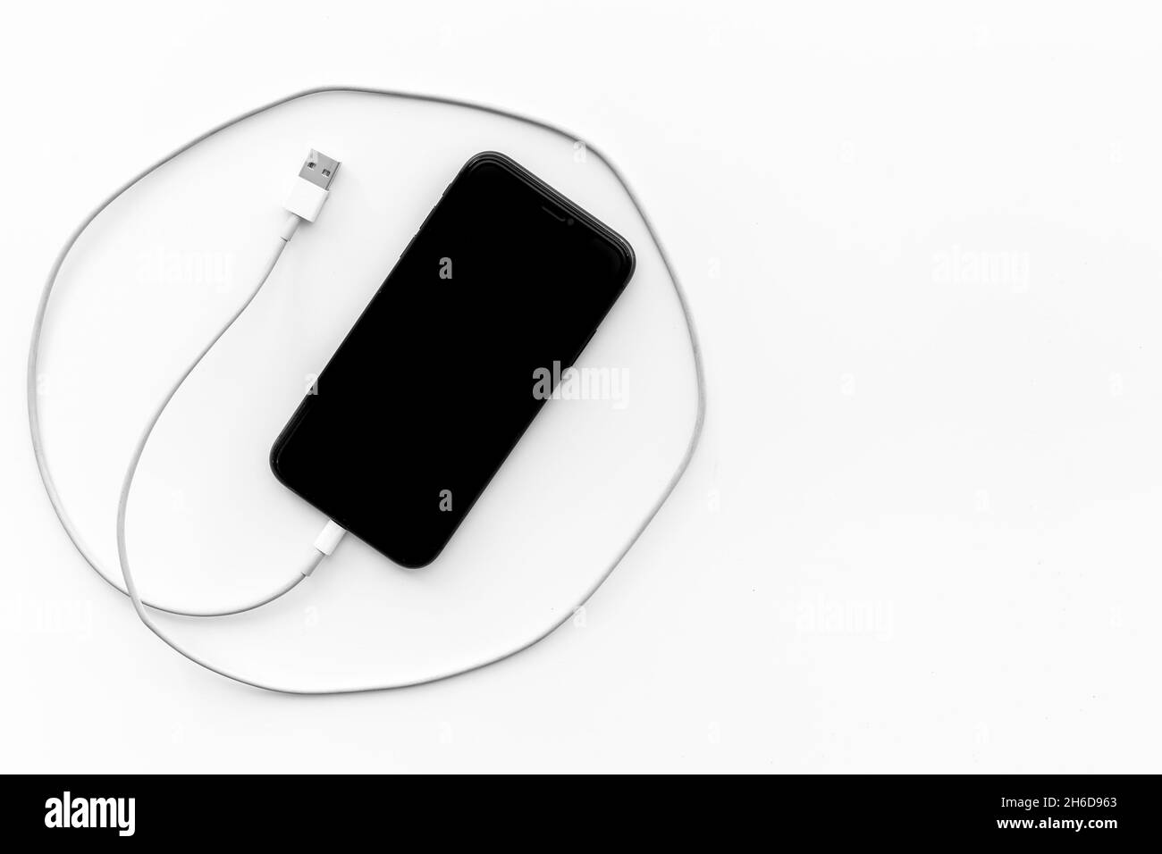 Usb cable for charging smartphone or laptop, top view Stock Photo - Alamy