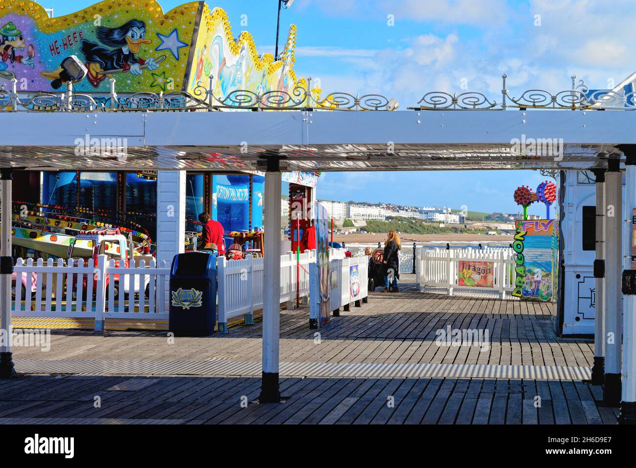 A colourful amusement arcade on the Palace Pier on a sunny autumn day ...