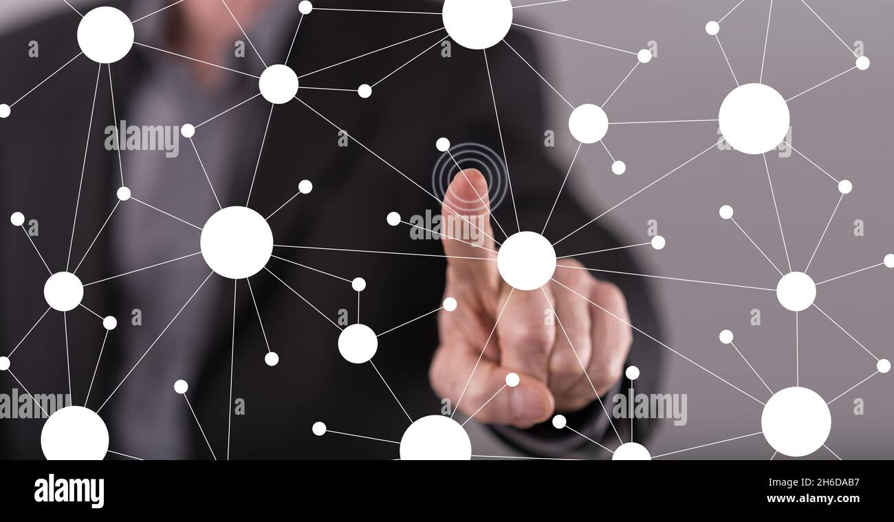 Man touching a virtual network on a touch screen with his finger Stock ...