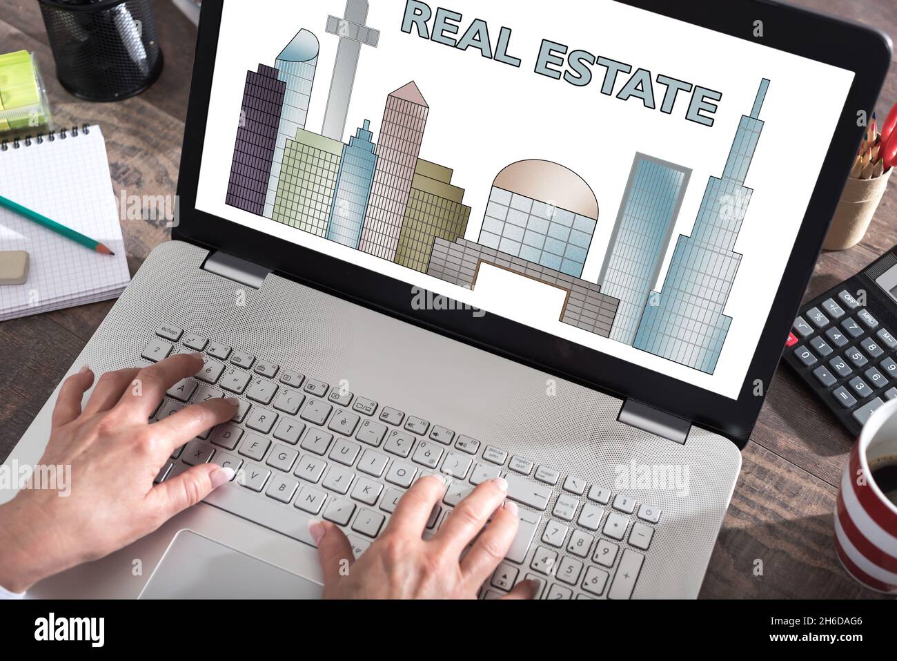 Real estate concept shown on a laptop screen Stock Photo - Alamy