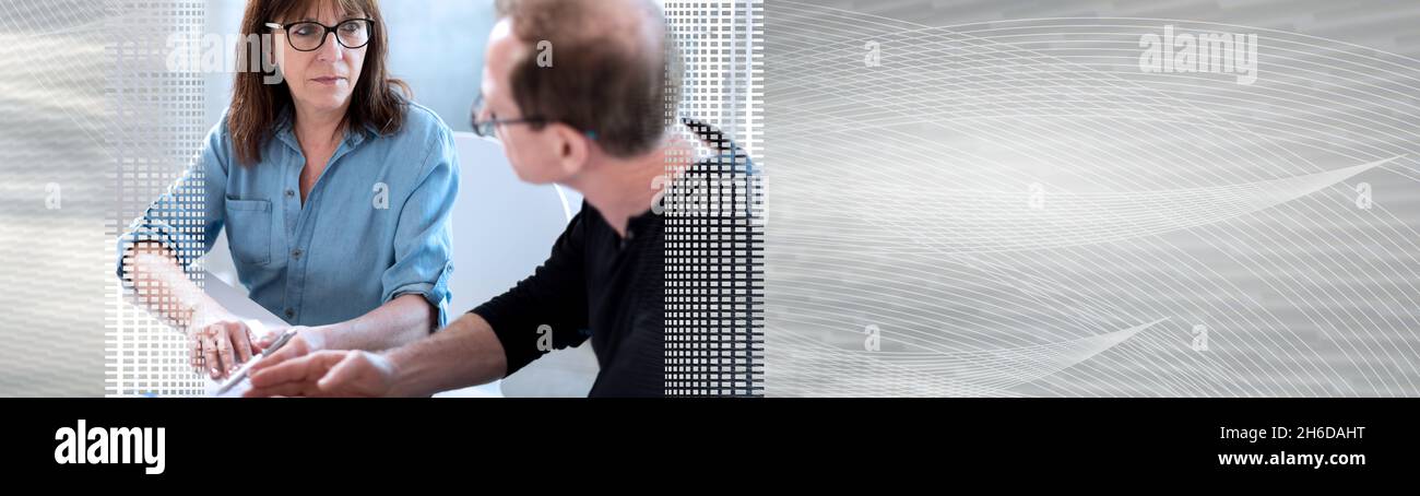 Coworkers having a business discussion in office. panoramic banner ...