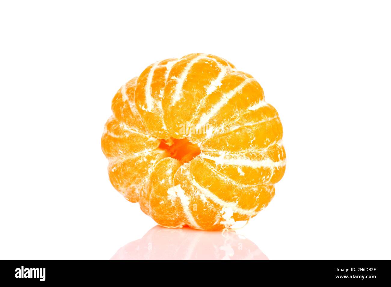 One peeled tangerine, close-up, isolated on white Stock Photo - Alamy