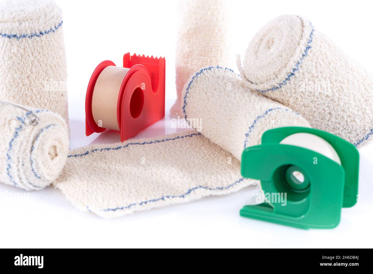 Medical bandages with sticking plaster, isolated on white Stock Photo ...