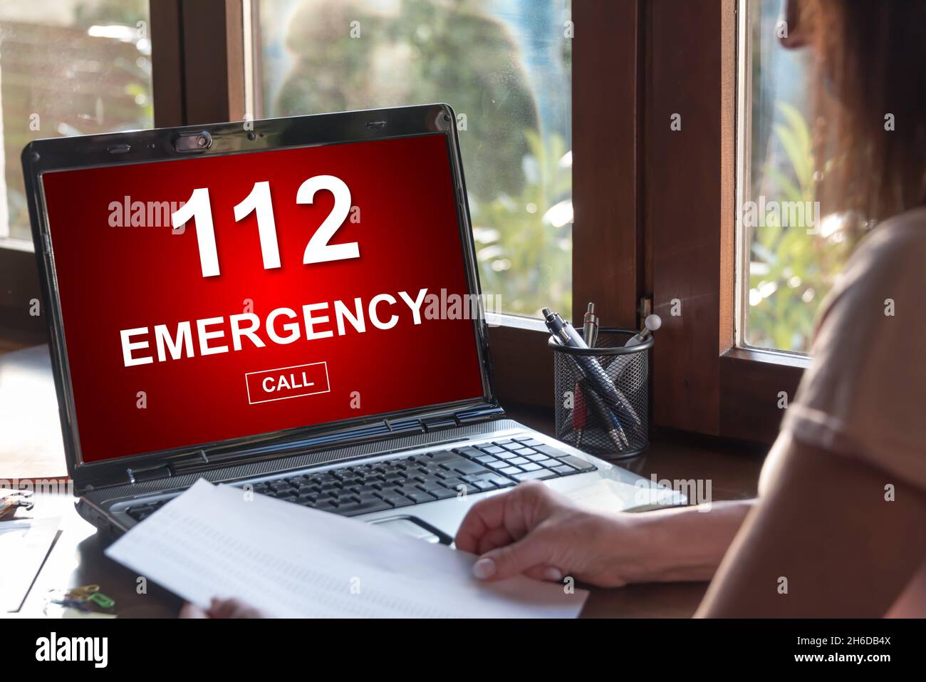 Laptop screen displaying an emergency concept Stock Photo - Alamy