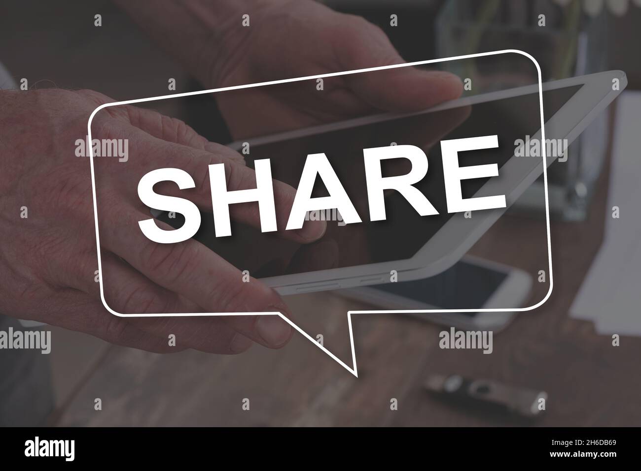 Share concept illustrated by a picture on background Stock Photo - Alamy