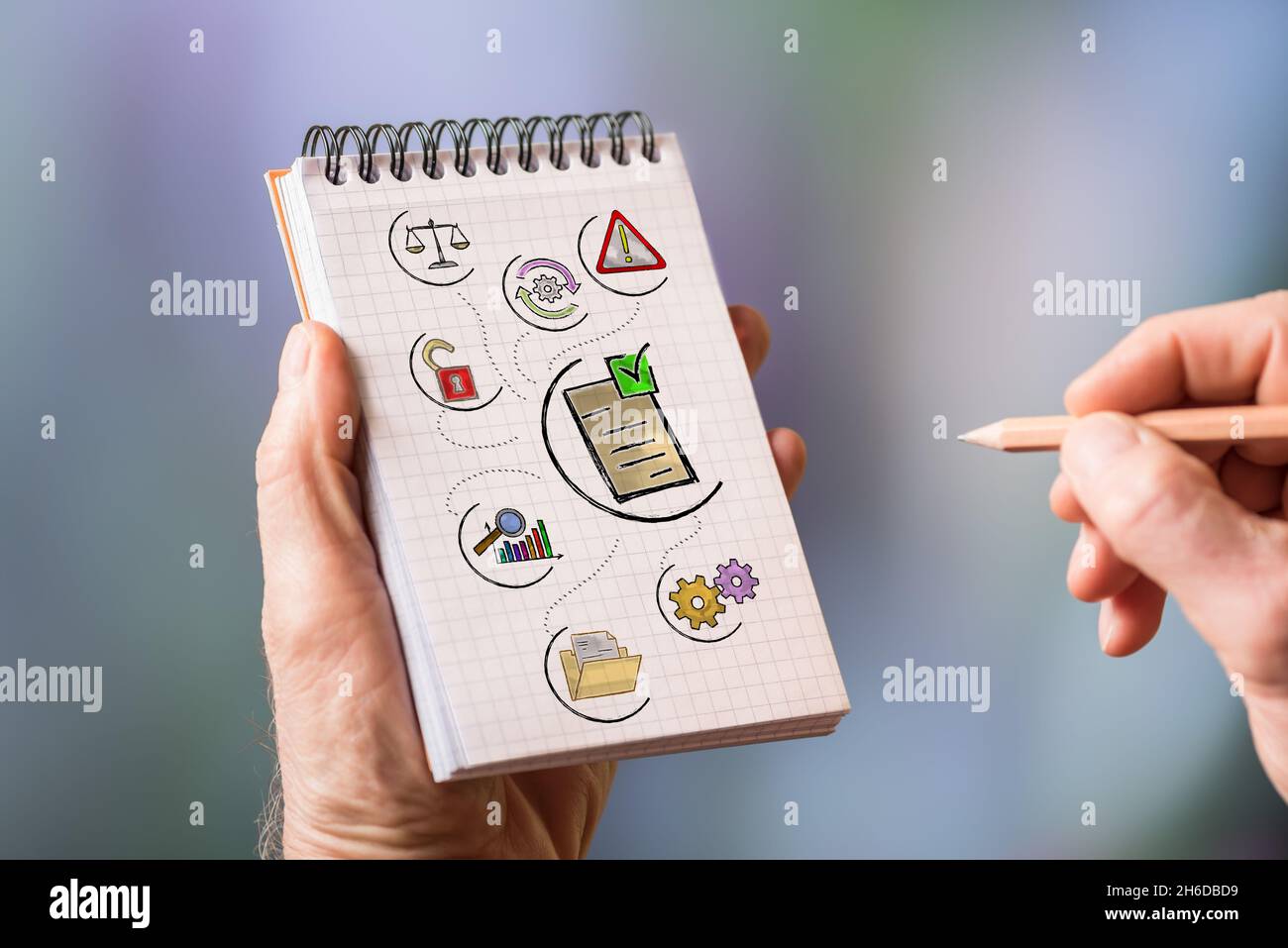 Hand drawing validation concept on a notepad Stock Photo - Alamy