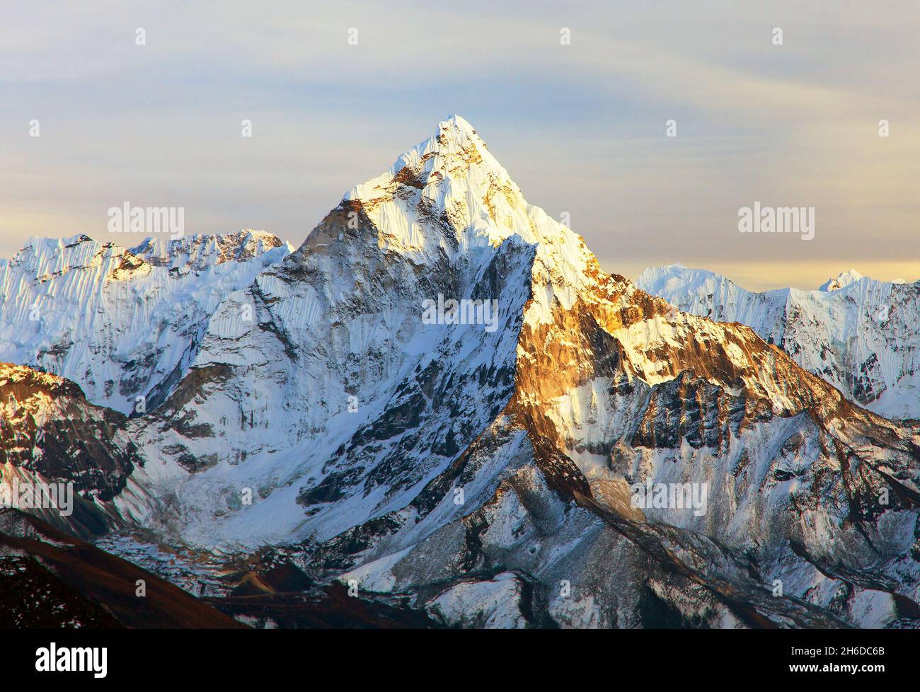 Evening panoramic sunset view of Ama Dablam with beautiful clouds on ...