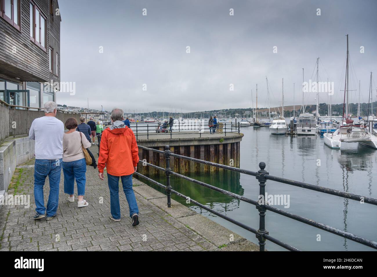 Visitors enjoying a stroll along the quayside in Discovery Quay in ...