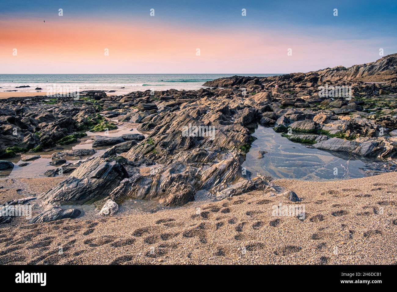 Rocks and rock pools at low tide at the secluded Little Fistral in ...