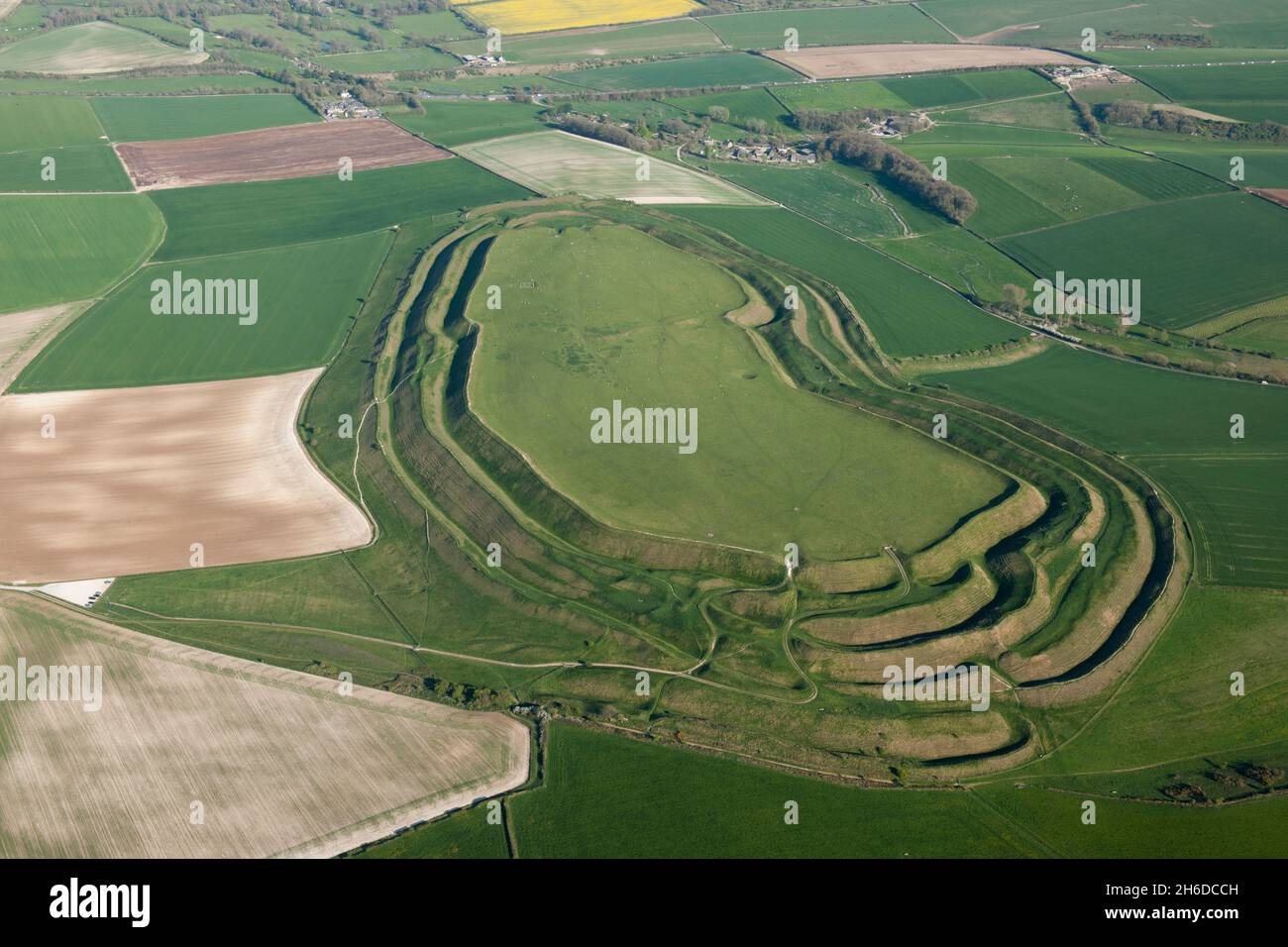 Maiden Castle, known primarily as an Iron Age multivallate hillfort ...