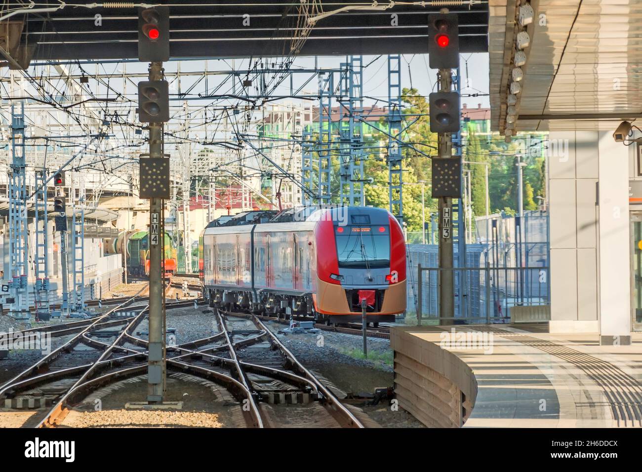 Train passing a railroad crossing. Dutch signs warning not go and red ...