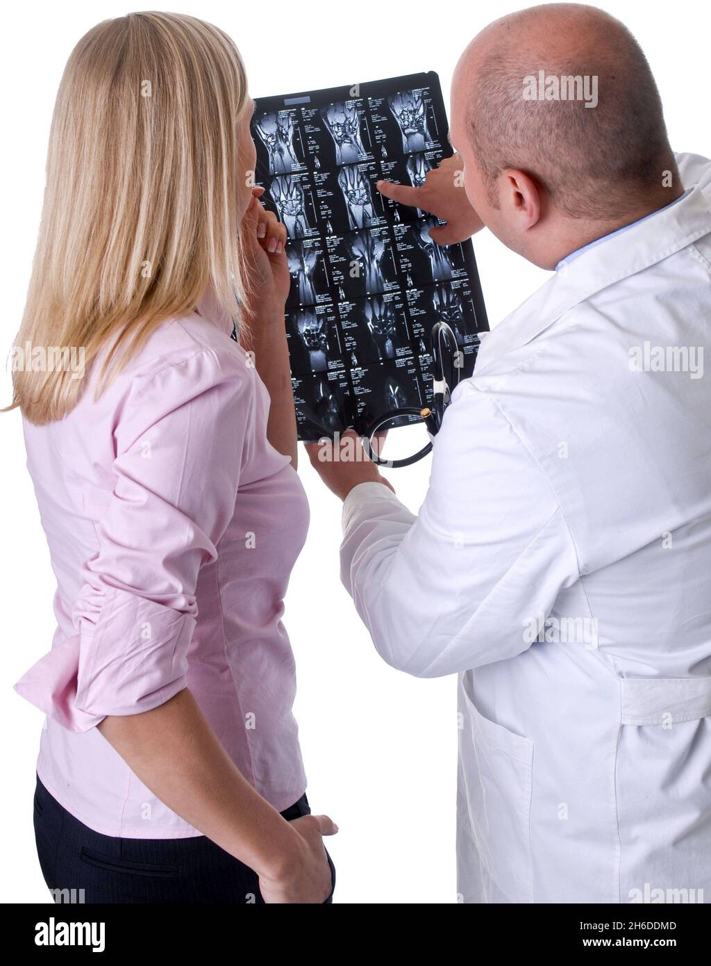 doctor with X-ray photograph in its hands talking with female patient ...