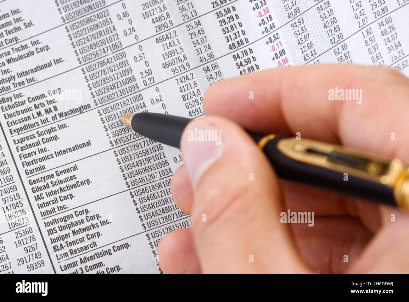 man reading a financial newspaper Stock Photo - Alamy