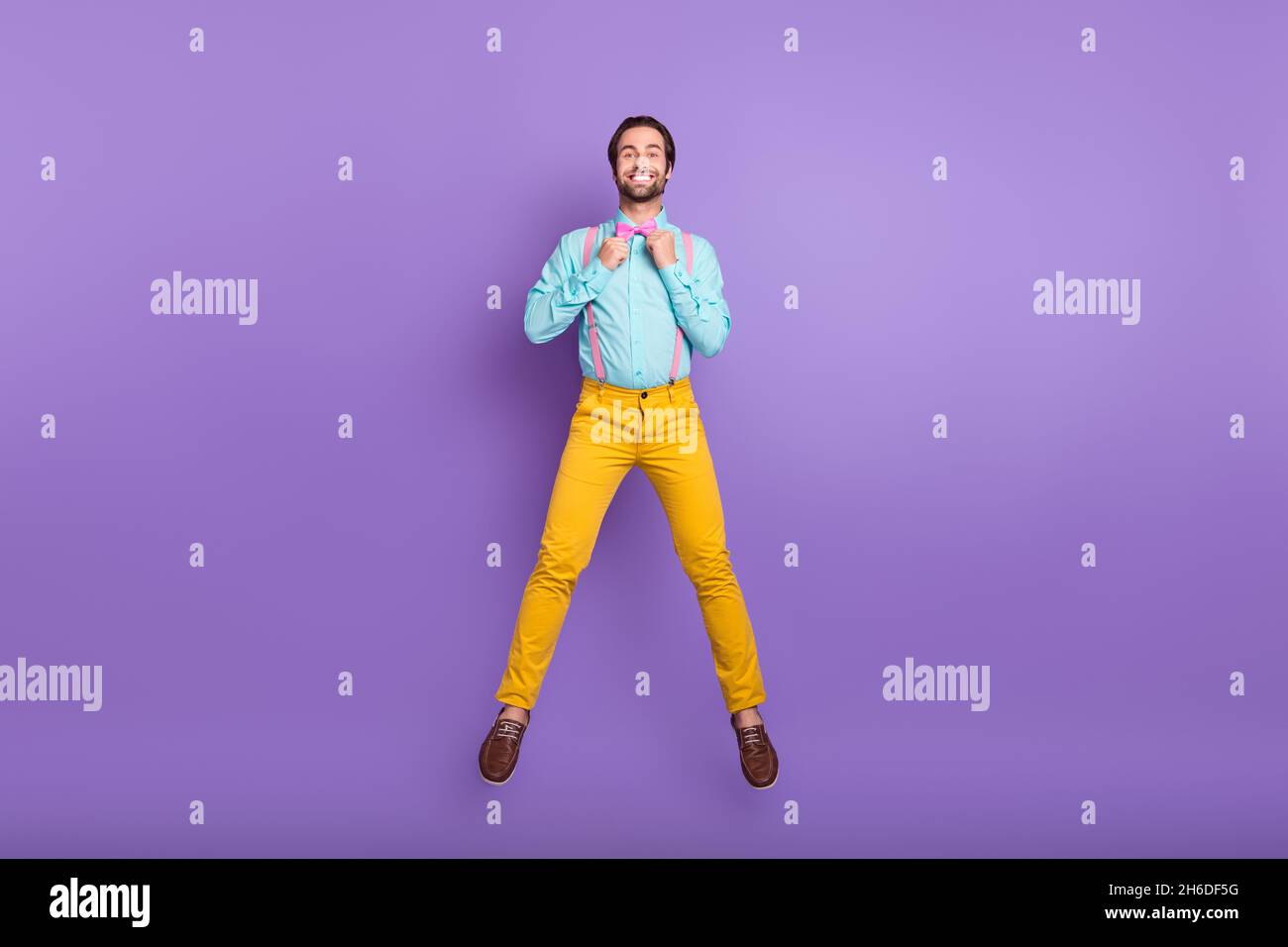 Full size photo of cool young brunet guy jump wear tie suspenders shirt ...