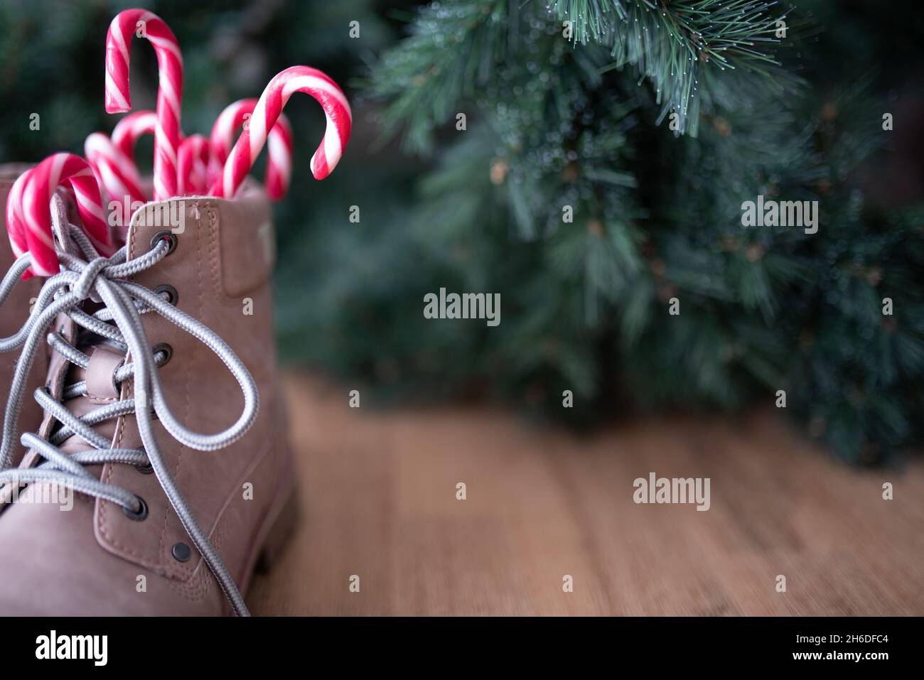 children's shoes with candy canes for st nicholas day Stock Photo - Alamy