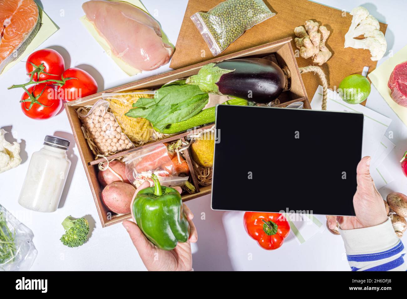 Meal Kit Delivery Concept. Set various healthy dishes food ingredients ...