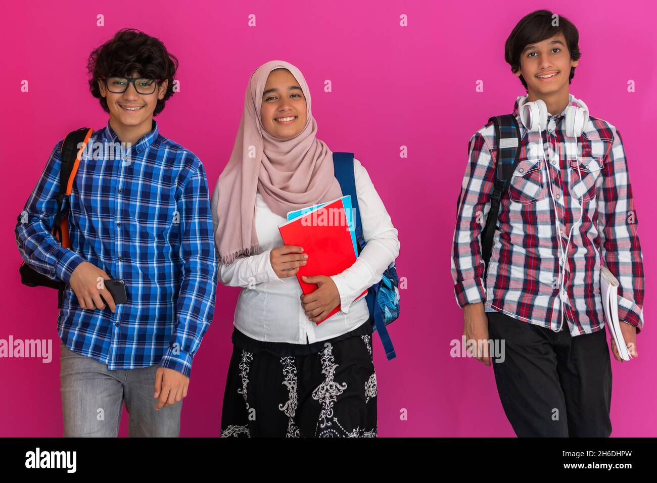 A group of Arab teenagers, a student team walking forward into the ...