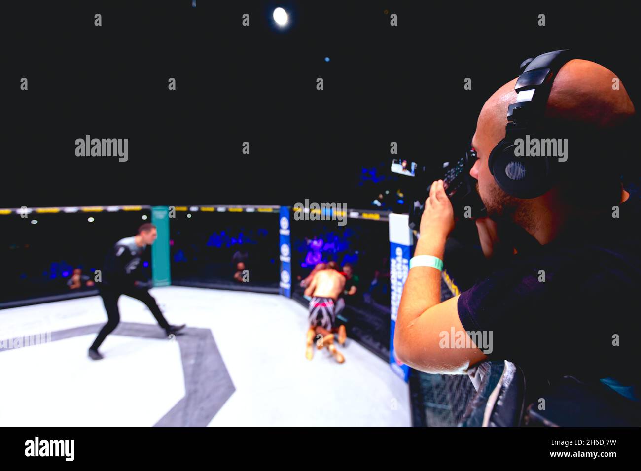 Professional cameraman, videographer is filming with camera for live ...