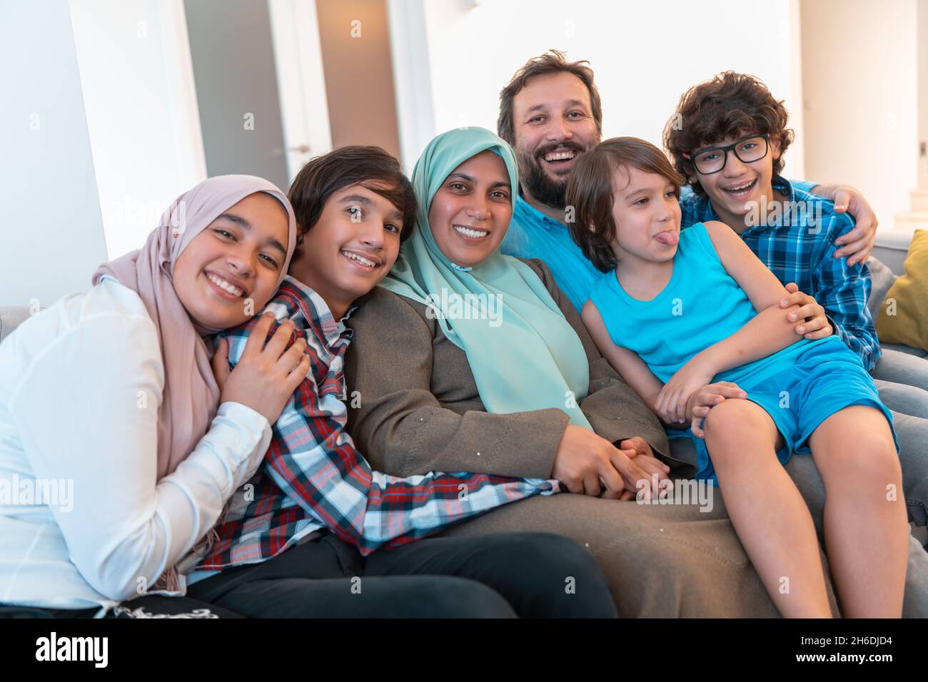 Muslim family portrait sofa hi-res stock photography and images - Alamy