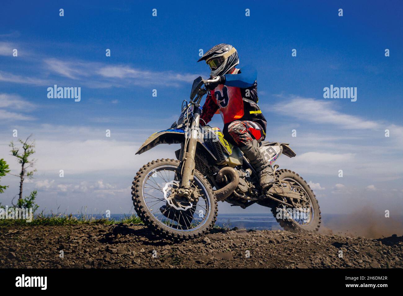 male rider in enduro motorcycle on top mountain Stock Photo - Alamy