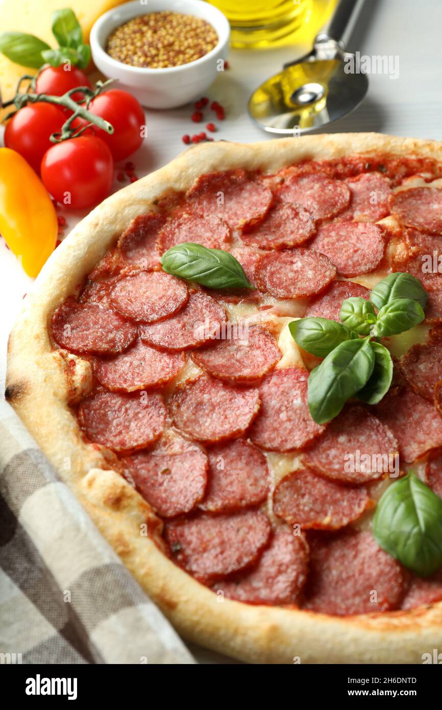 Concept of tasty food with Salami pizza, close up Stock Photo - Alamy