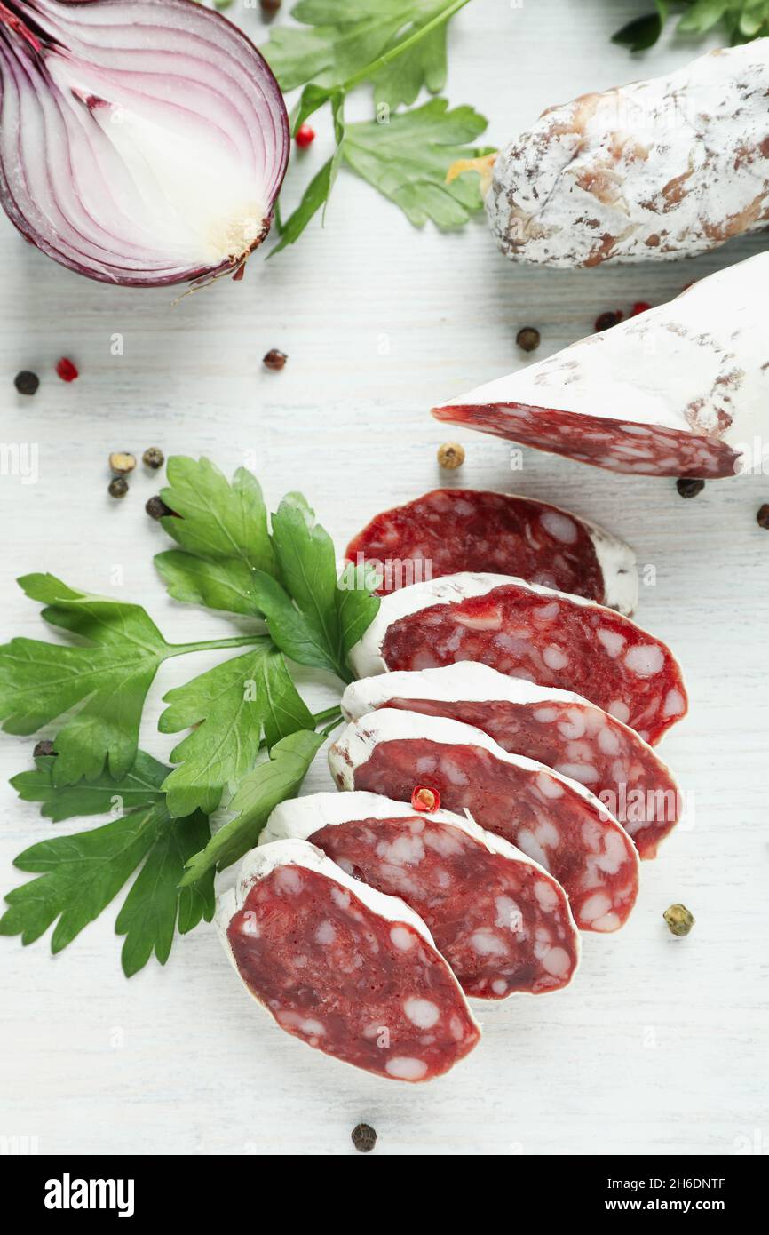 Сoncept of tasty food with salami sausage, close up Stock Photo - Alamy