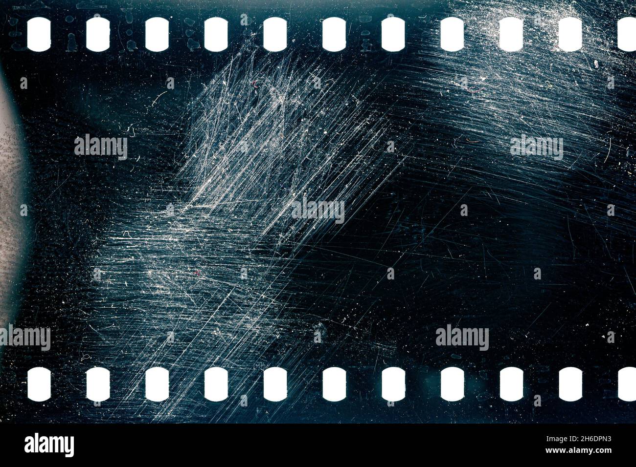Dusty and grungy 35mm film texture or surface. Perforated scratched ...