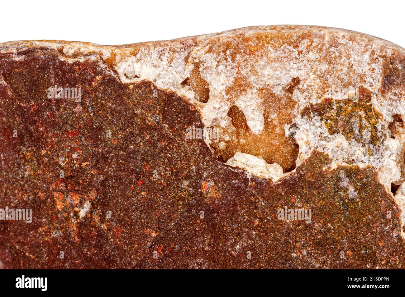 Part of a dark red stone isolated on white background Stock Photo - Alamy