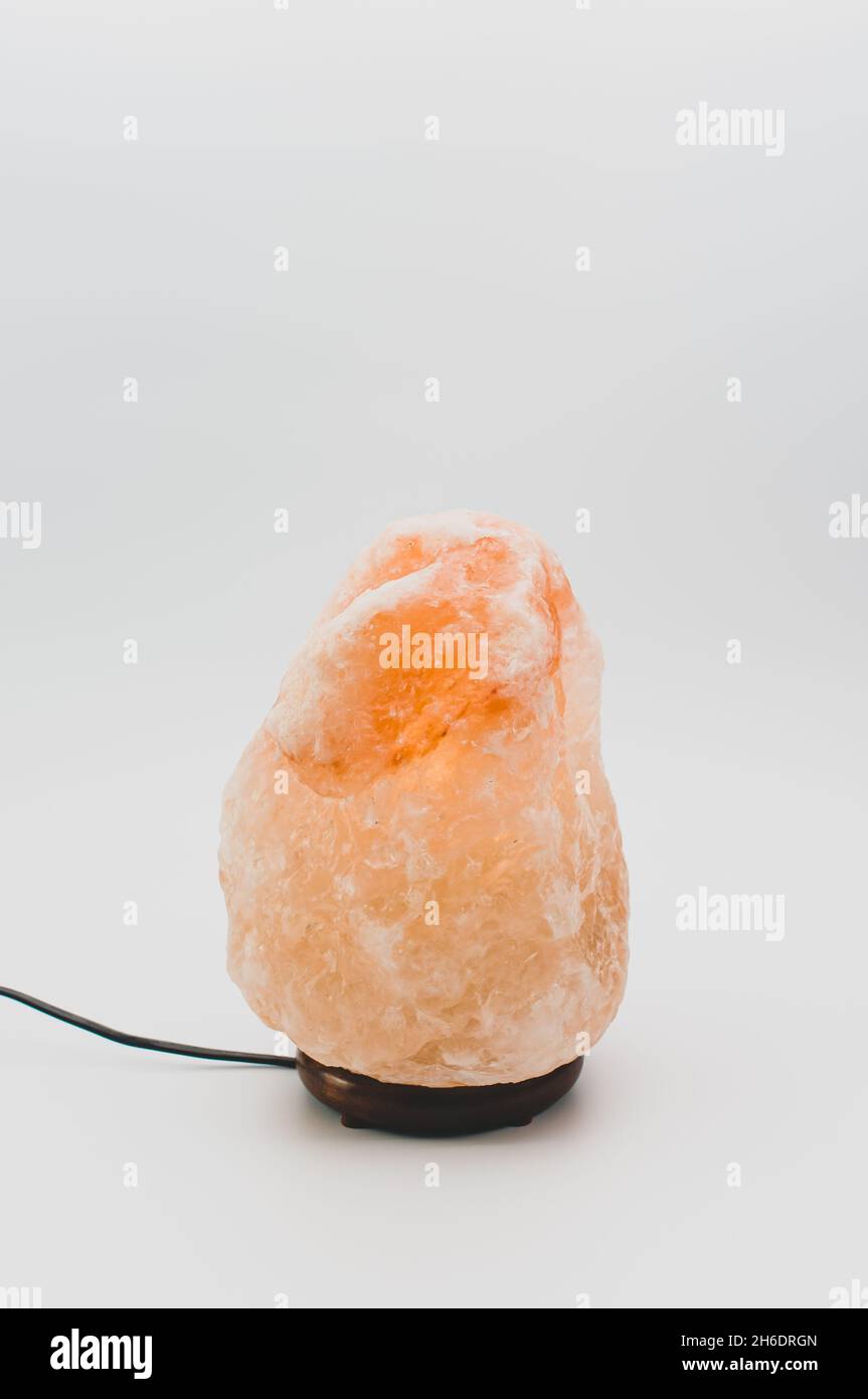 Himalayan salt lamp on a white background with copy space Stock Photo ...