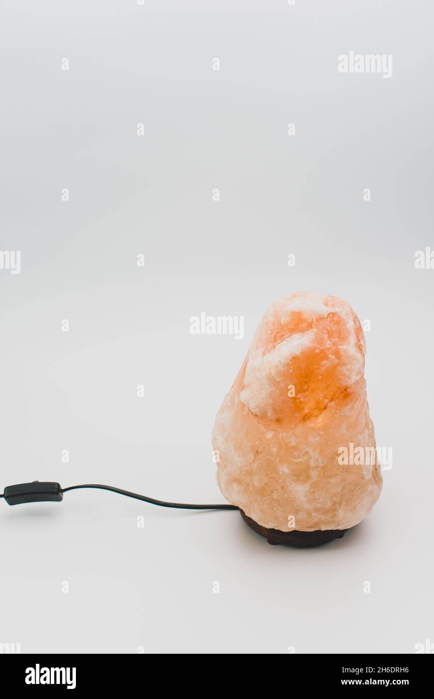 Himalayan salt lamp on a white background with copy space Stock Photo ...