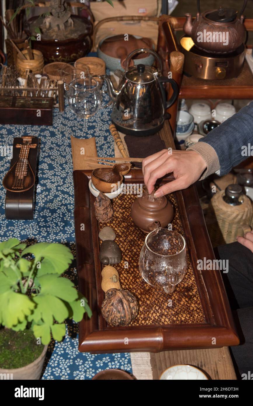 Chinese Tea Ceremony. Male server prepares the traditional tea ...