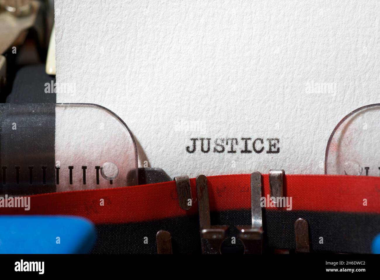 The word justice written with a typewriter Stock Photo - Alamy