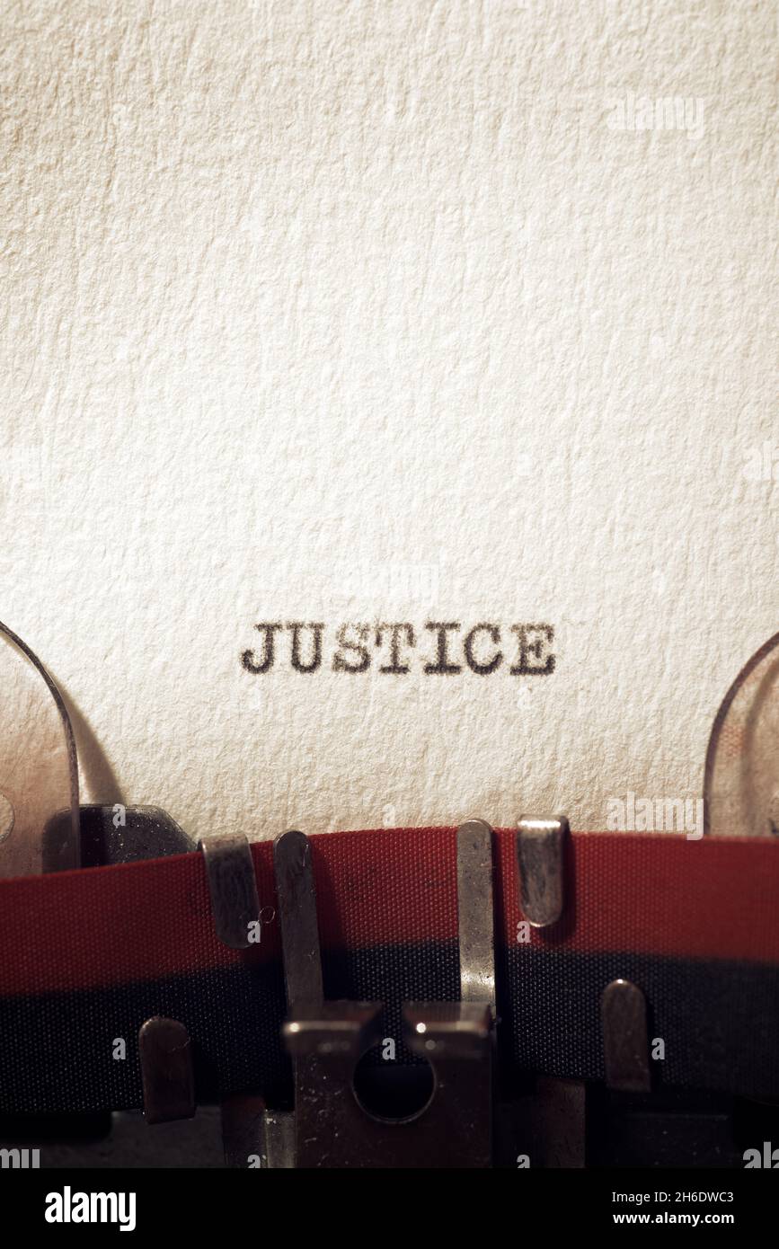 The word justice written with a typewriter Stock Photo - Alamy