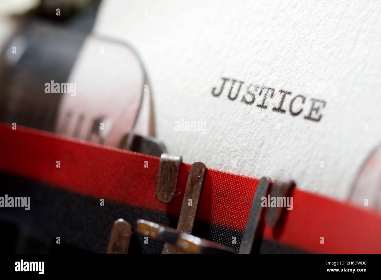 The word justice written with a typewriter Stock Photo - Alamy